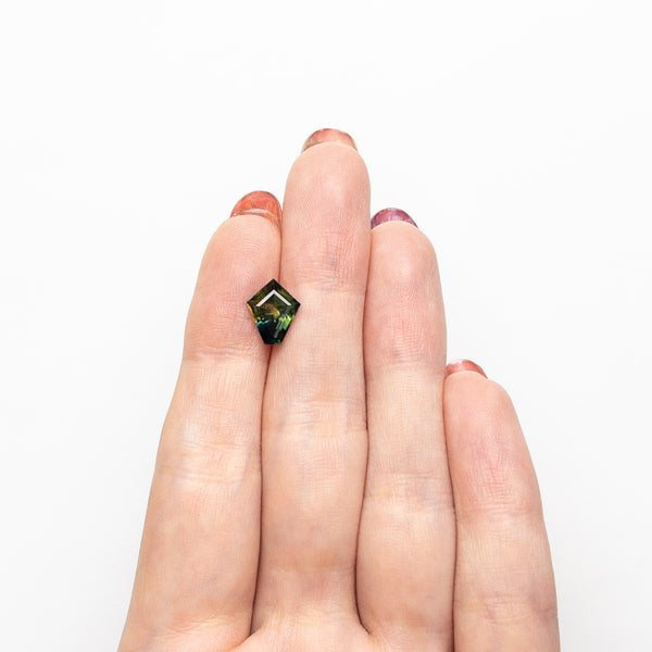 2.28ct 9.93x8.31x4.51mm Shield Step Cut Sapphire 25388-01 - Misfit Diamonds