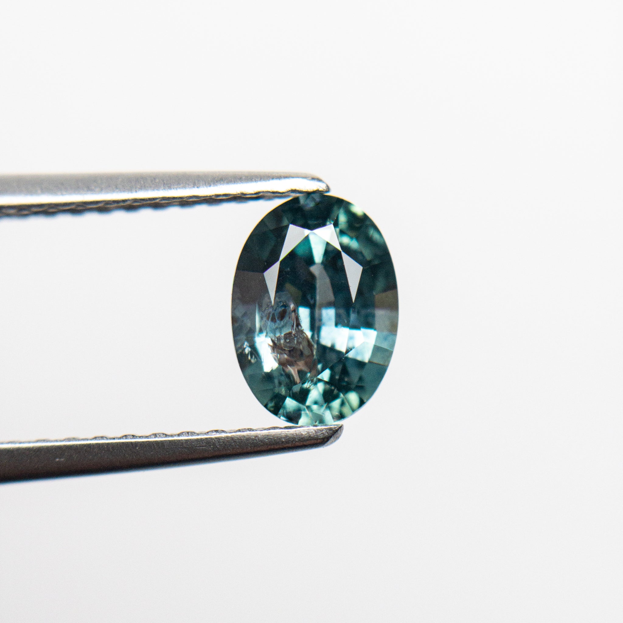 0.95ct 6.98x5.07x3.34mm Oval Brilliant Sapphire 19939-83 - Misfit Diamonds