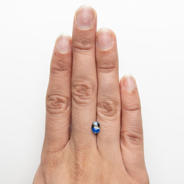 1.24ct 6.99x5.14x4.28mm Oval Brilliant Sapphire 22991-01 - Misfit Diamonds